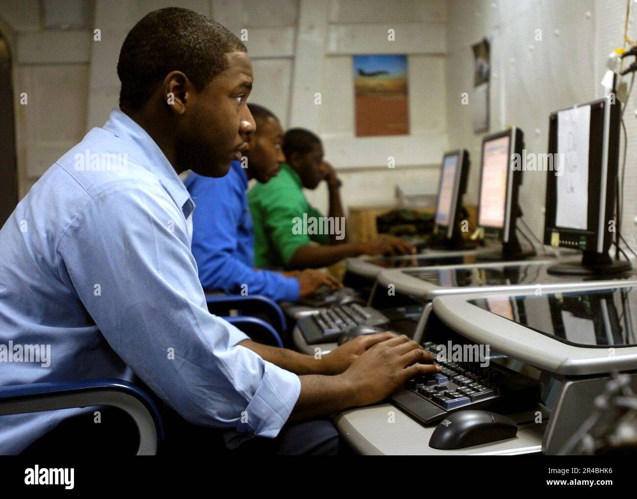 US Navy Sailors use email to communicate with friends and family in the ...