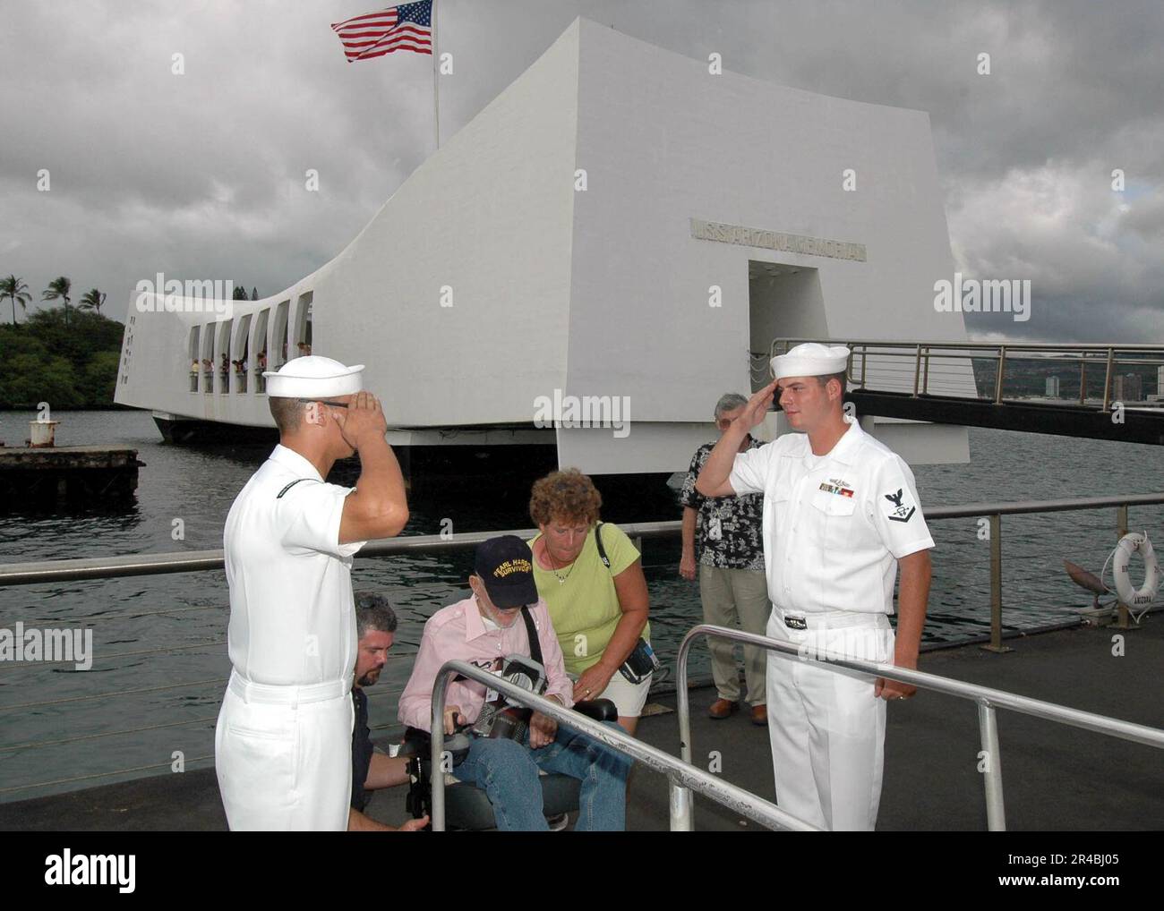 US Navy Sailors assigned to the USS Arizona Memorial Detachment render ...