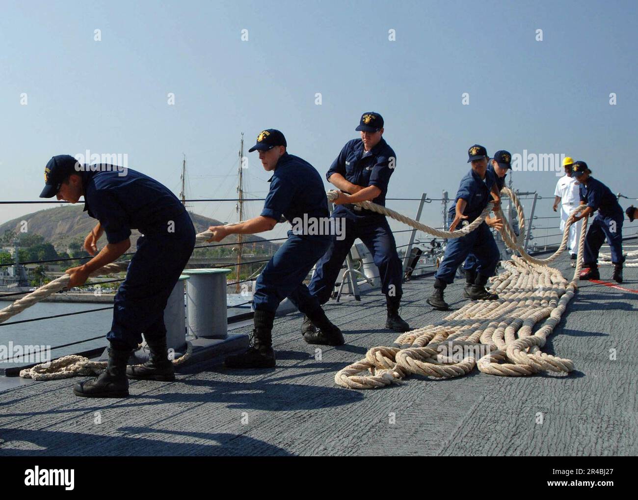 US Navy Sailors aboard the guided missile destroyer USS Ross (DDG 71 ...