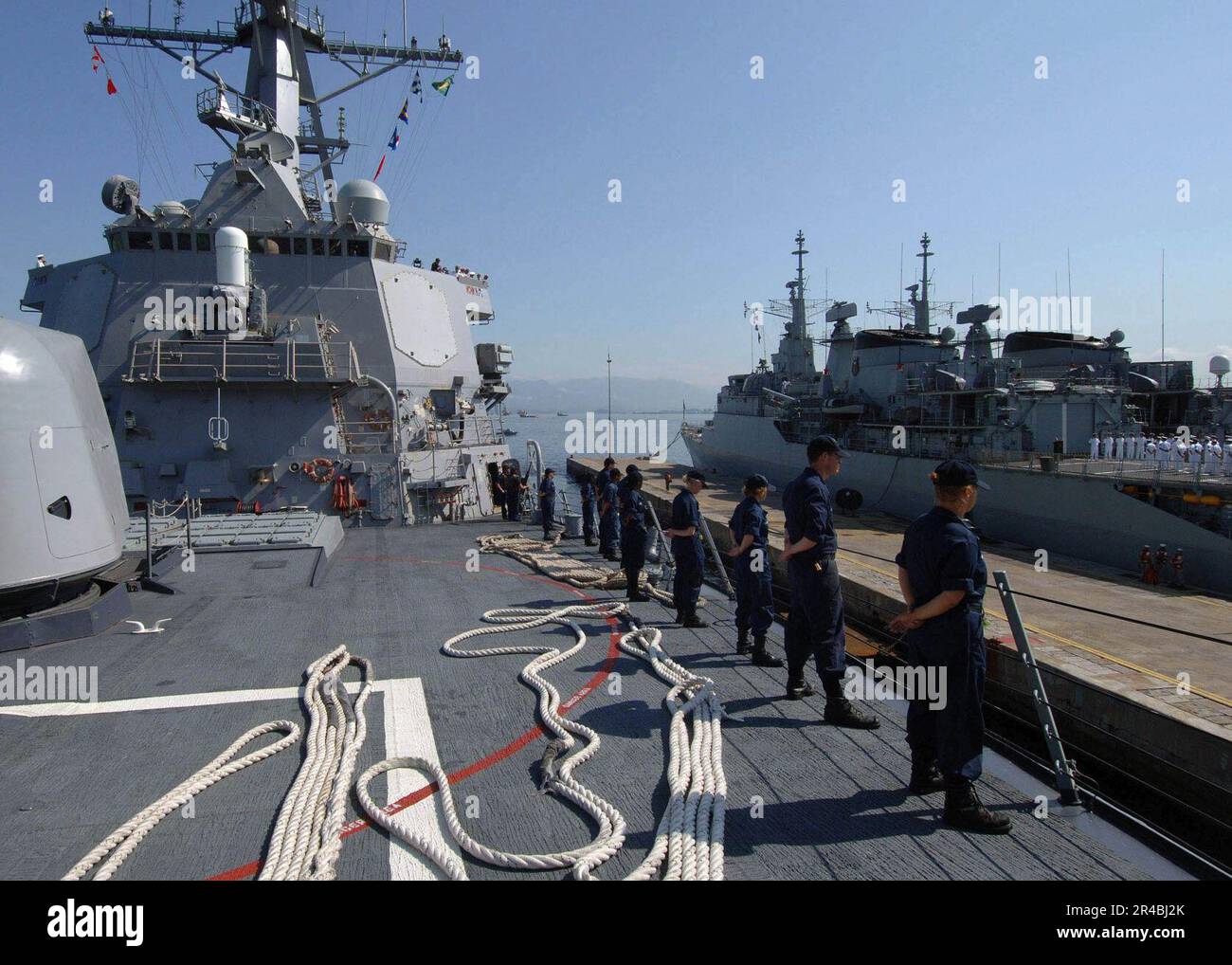 US Navy Sailors aboard the guided missile destroyer USS Ross (DDG 71 ...