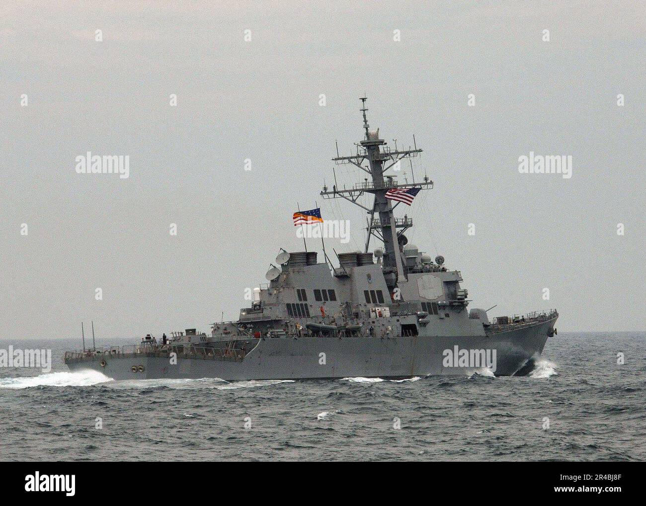 US Navy The guided missile destroyer USS Ross (DDG 71) maneuvers ...