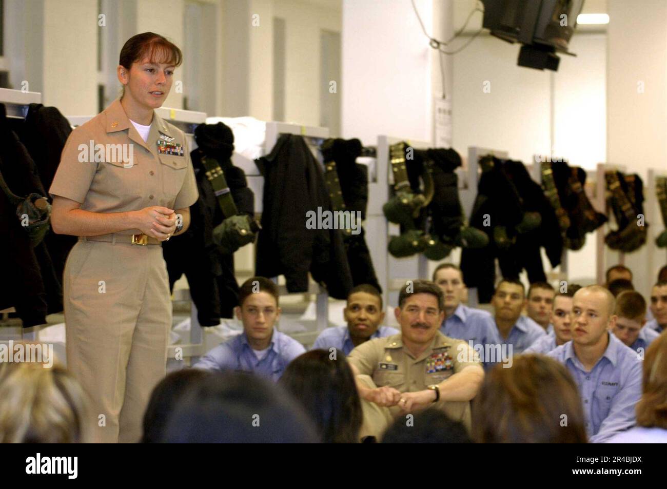 US Navy Master Chief Petty Officer of the Navy Terry Scott sits with ...