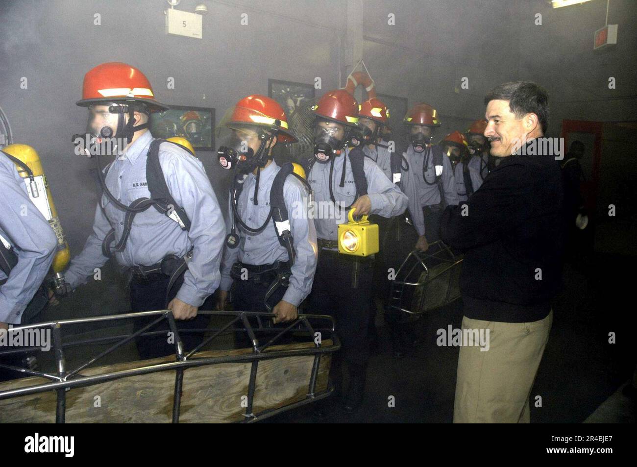 US Navy Master Chief Petty Officer of the Navy Terry Scott observes a ...