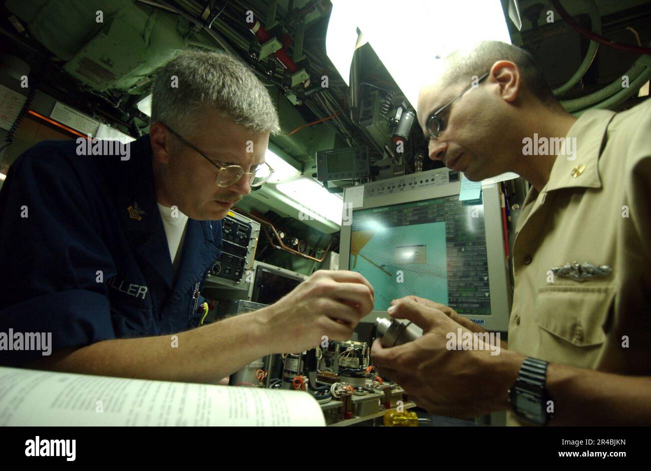US Navy Electronics Technician 1st Class left, and Chief Electronics ...