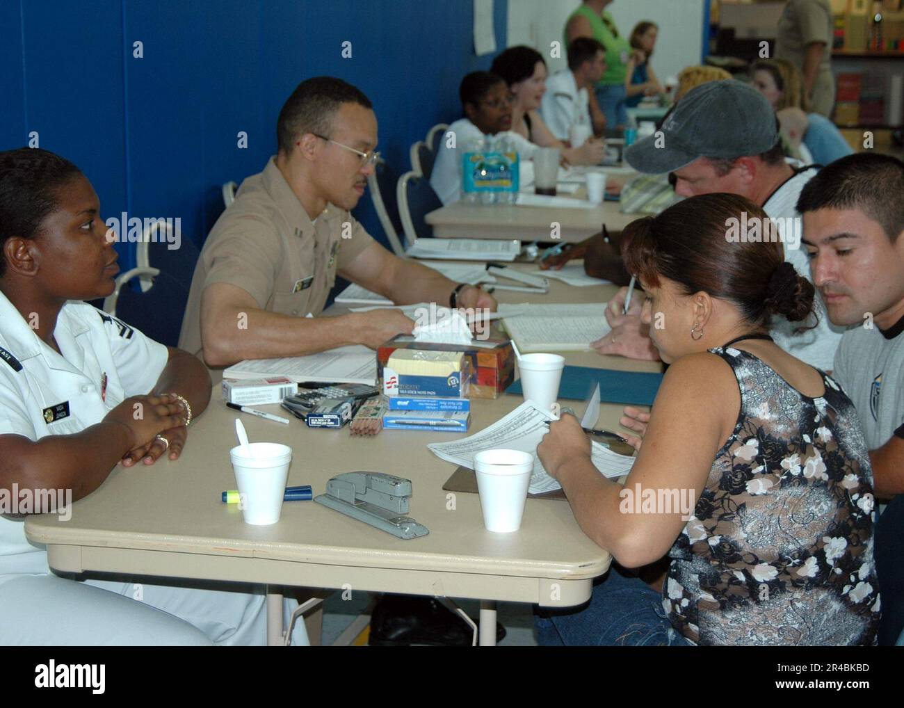 US Navy Legalman 2nd Class left, and Lt. both of Navy Legal Services ...