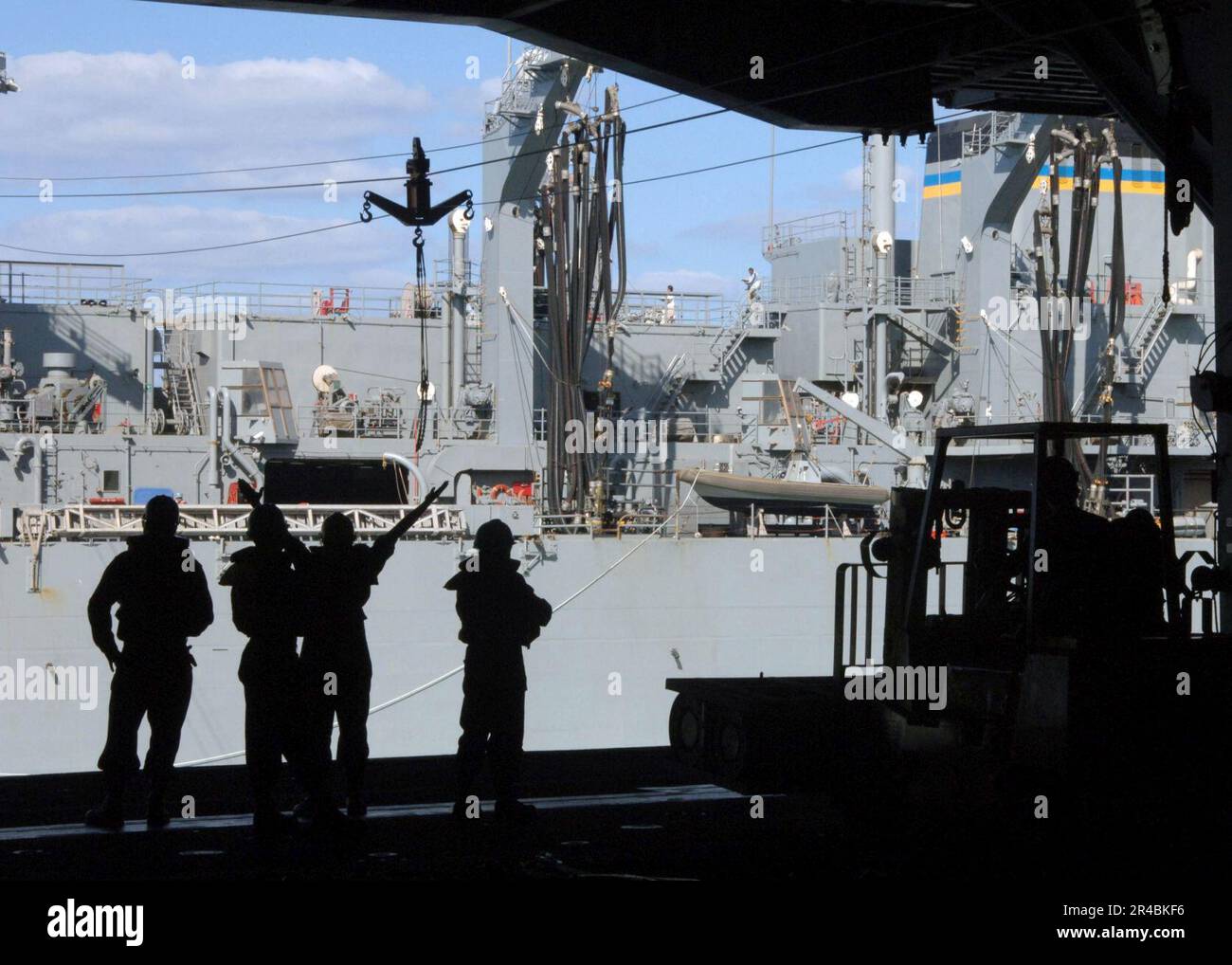 US Navy Deck Department personnel aboard the Nimitz-class aircraft ...