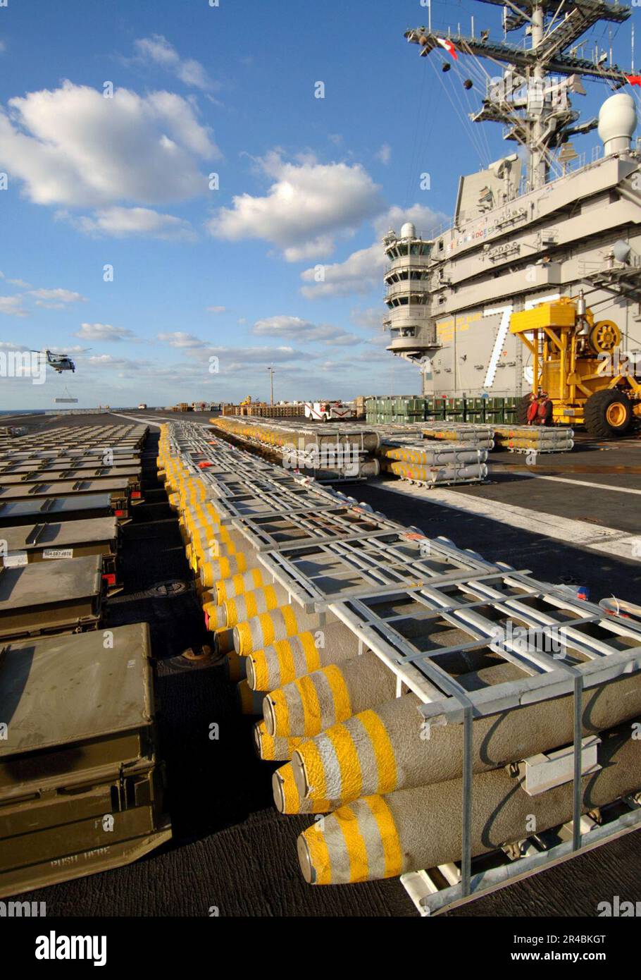 US Navy Pallets of general-purpose bombs line the flight deck of the ...