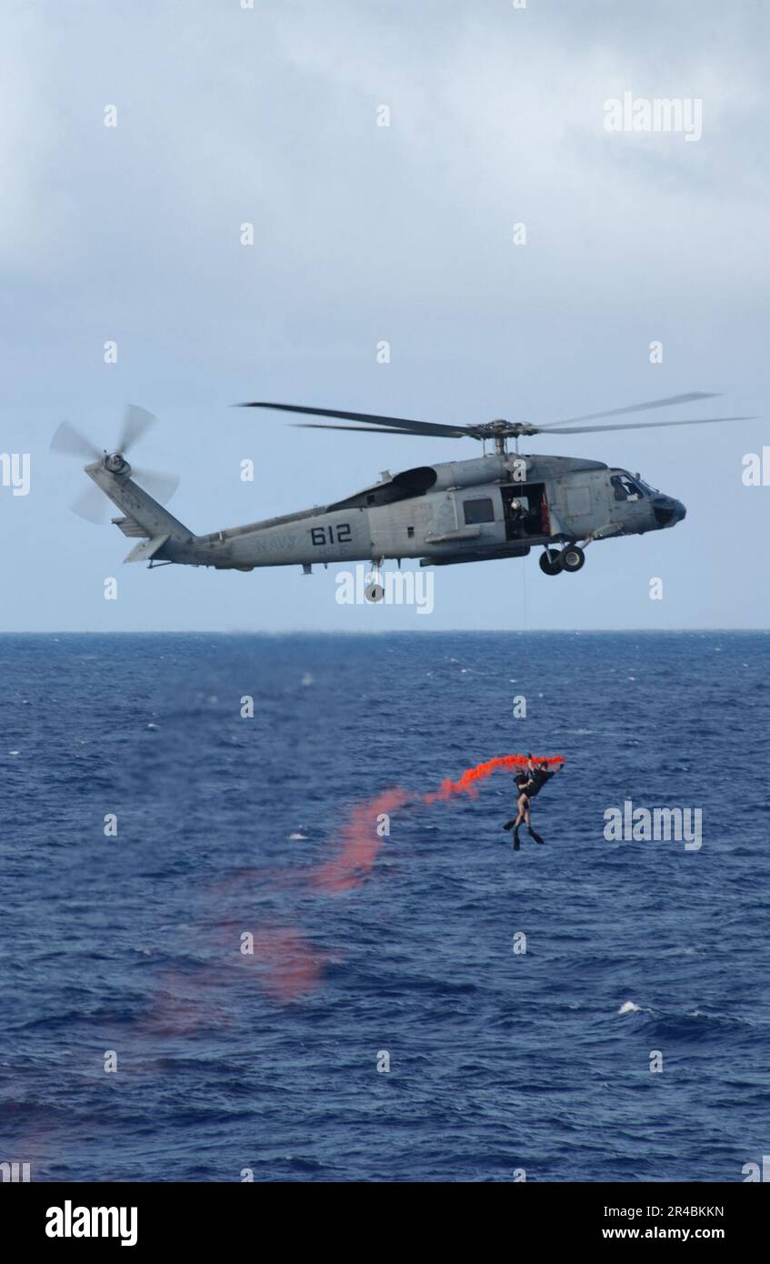US Navy An SH-60F Seahawk demonstrate search and rescue techniques ...