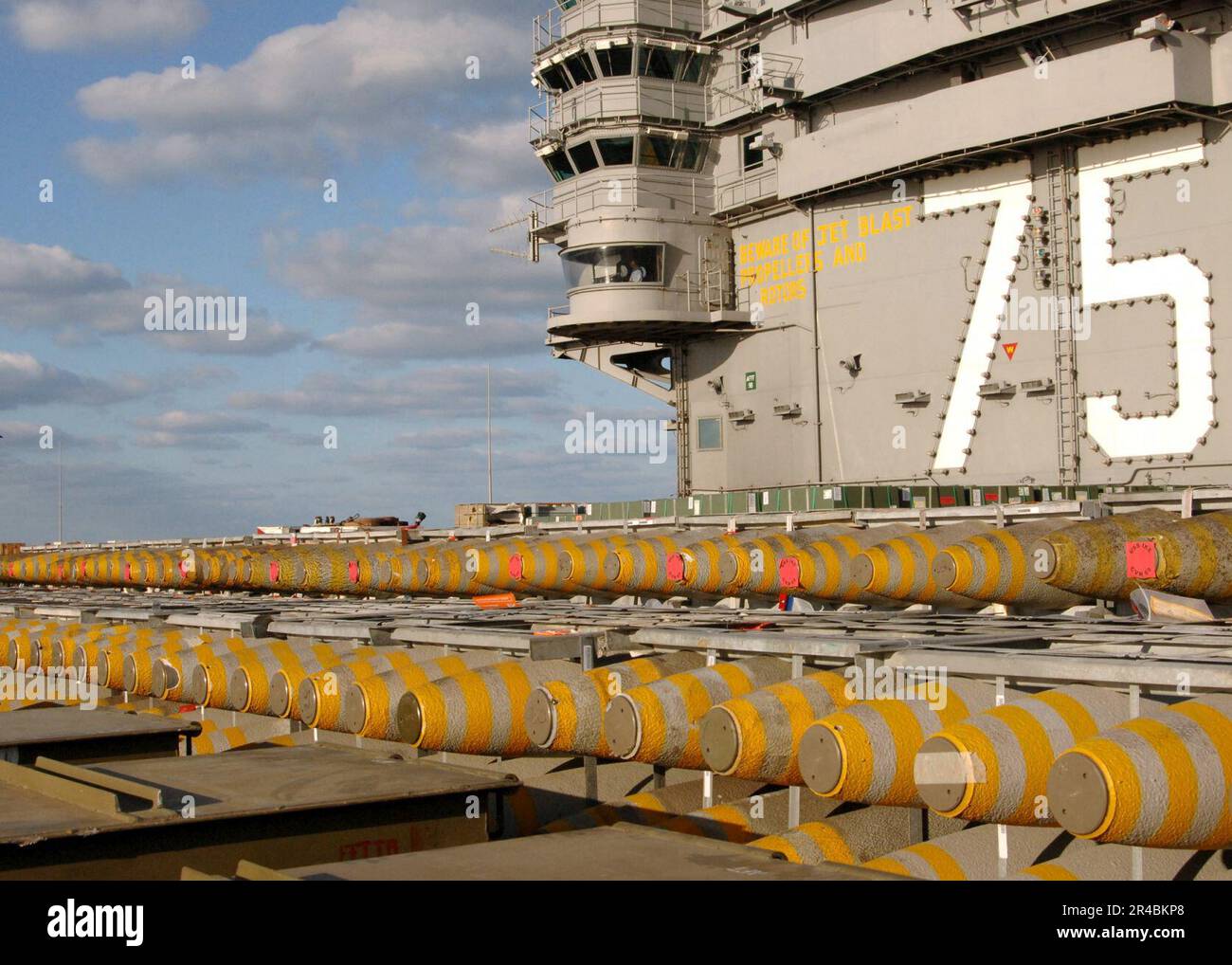 US Navy Pallets of general-purpose bombs line the flight deck of the ...
