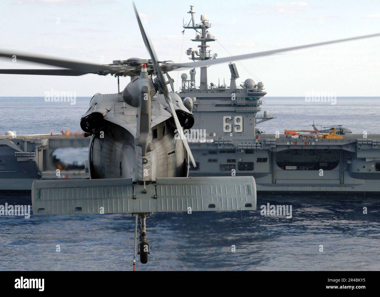 US Navy An MH-60S Seahawk helicopter, assigned to the Bay Raiders of ...