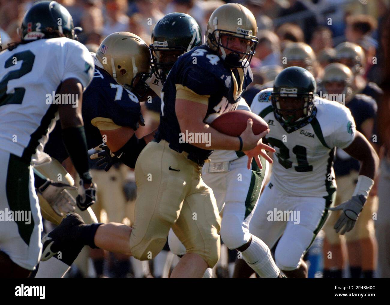US Navy U.S. Naval Academy Midshipman 2nd Class (34) carries the ball ...