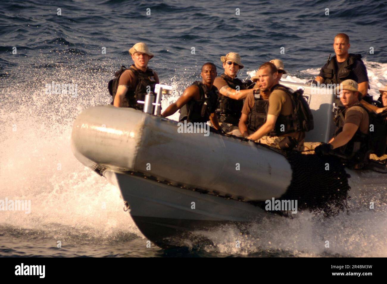 US Navy A Visit, Board, Search and Seizure (VBSS) team from the guided ...