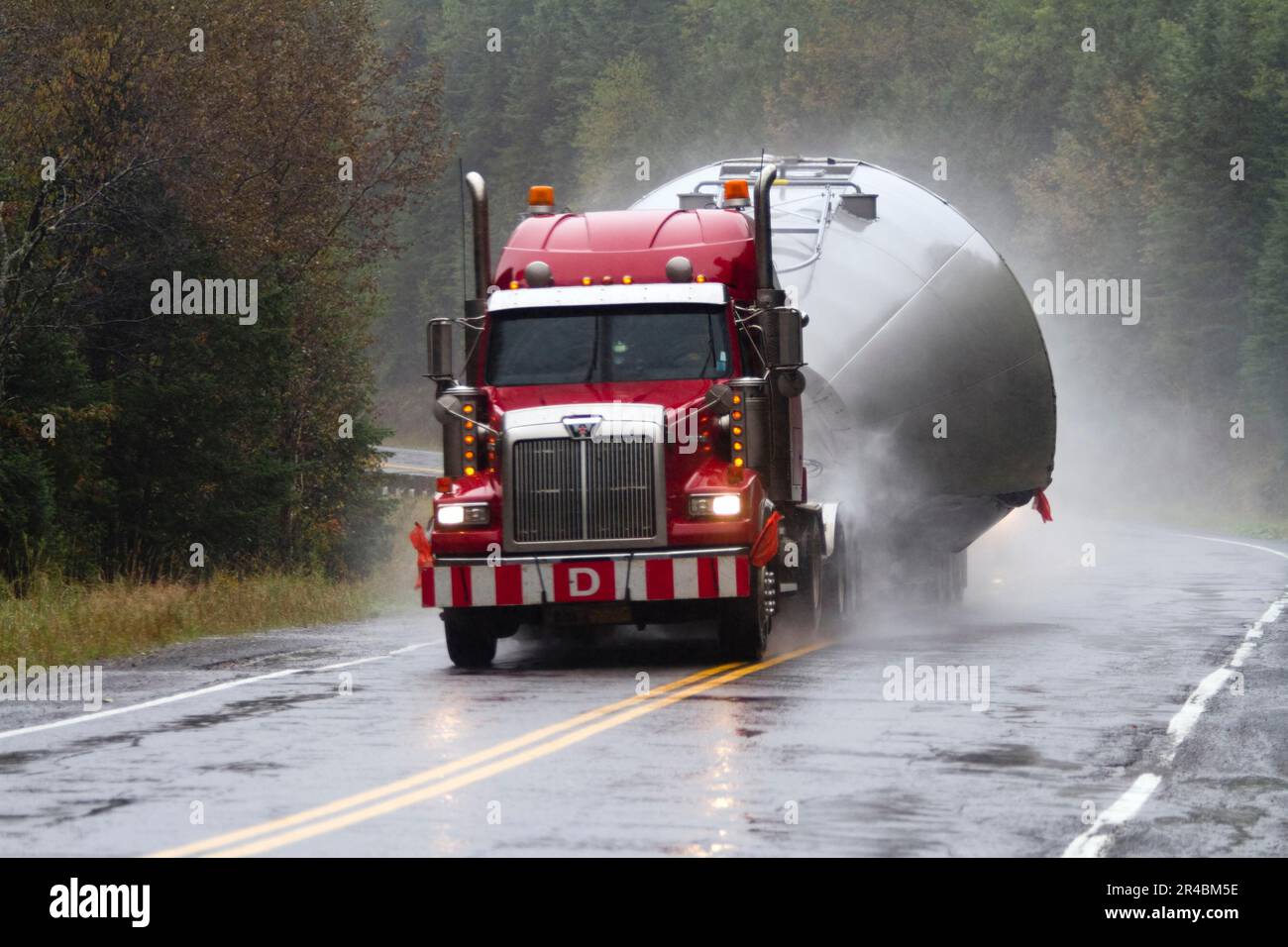 Heavy transporter, Gaspesie National Park, Quebec, heavily loaded ...