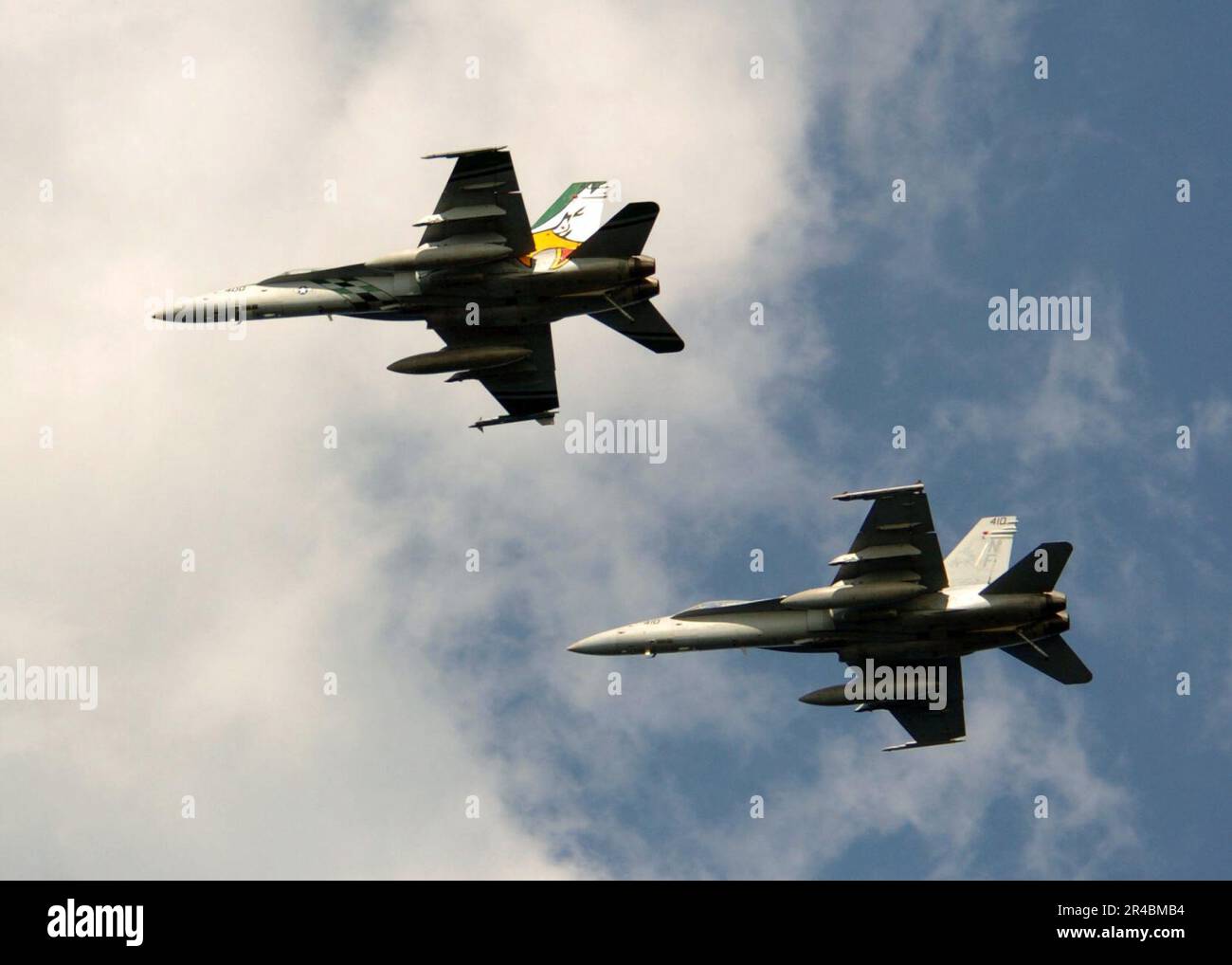 US Navy Two F-A-18C Hornets, assigned to the Dambusters of Strike ...