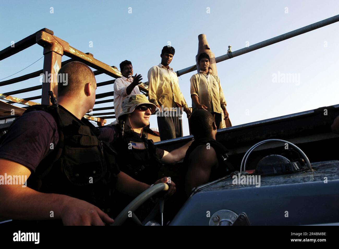 US Navy Members of the Visit, Board, Search and Seizure (VBSS) team ...