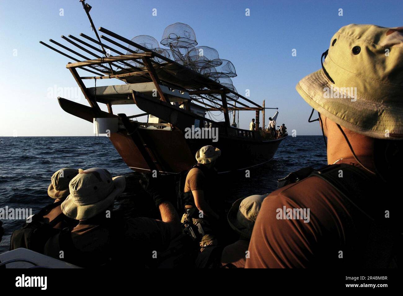 US Navy Members of the Visit, Board, Search and Seizure (VBSS) team ...
