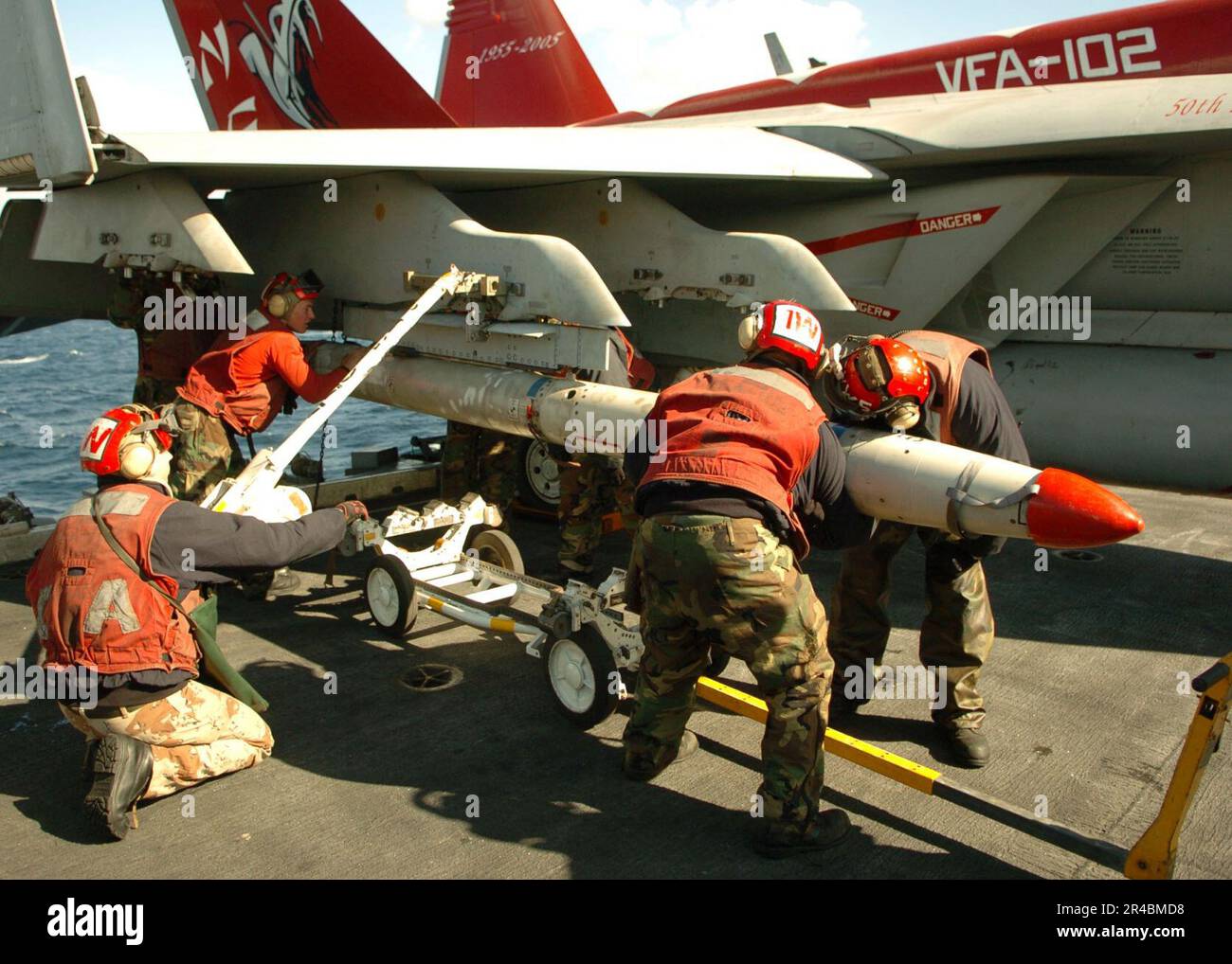 US Navy Aviation Ordnancemen assigned to the Diamondbacks of Strike ...