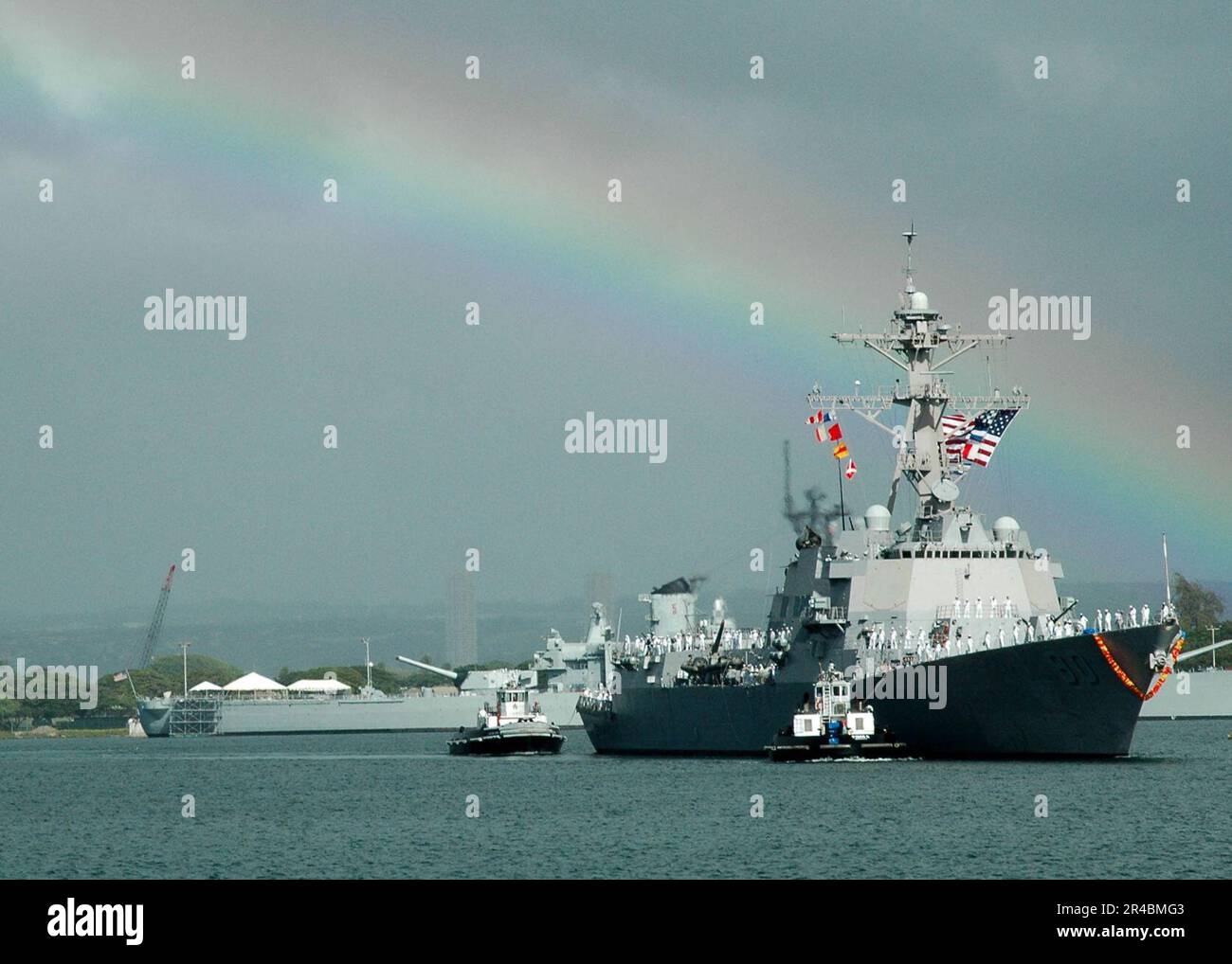 US Navy Sailors man the rails aboard the guided missile destroyer USS ...