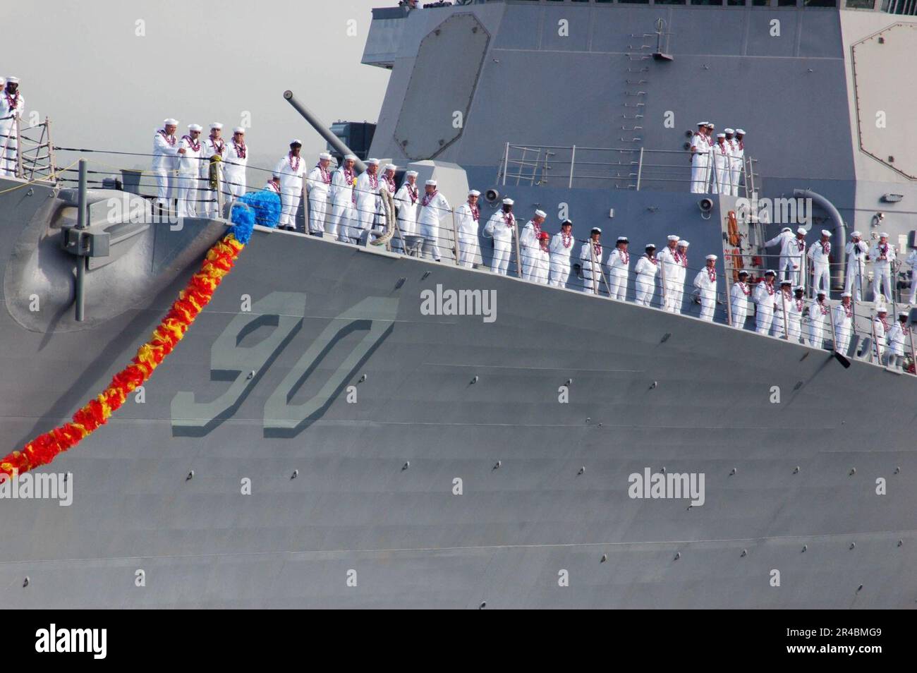 US Navy Sailors man the rails aboard the guided missile destroyer USS ...