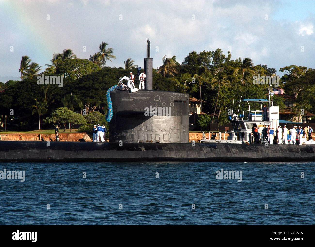 US Navy Sailors aboard the Los Angeles-class fast attack submarine USS ...