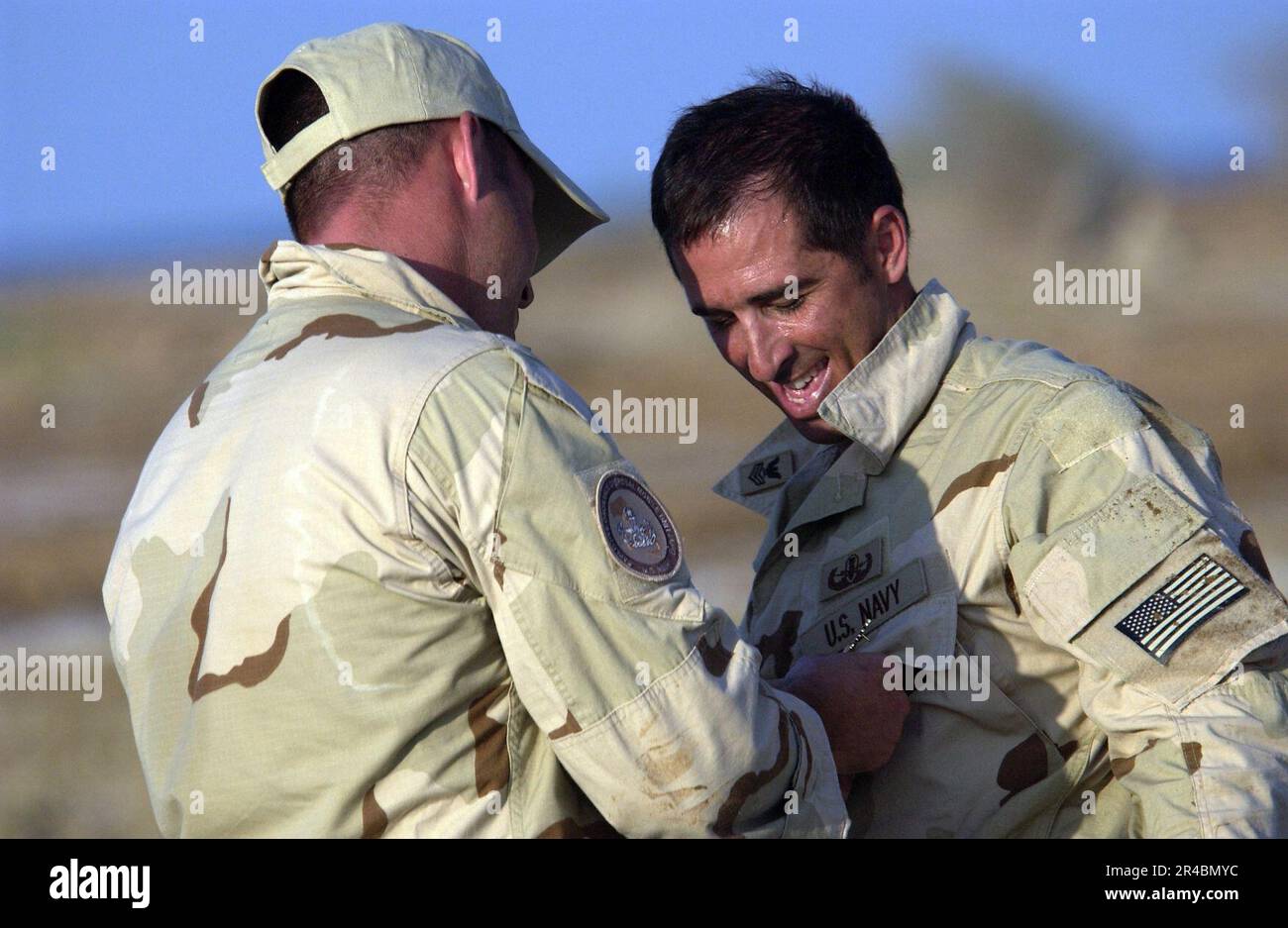 US Navy U.S. Navy Chief left, assigned to Explosive Ordnance Disposal ...