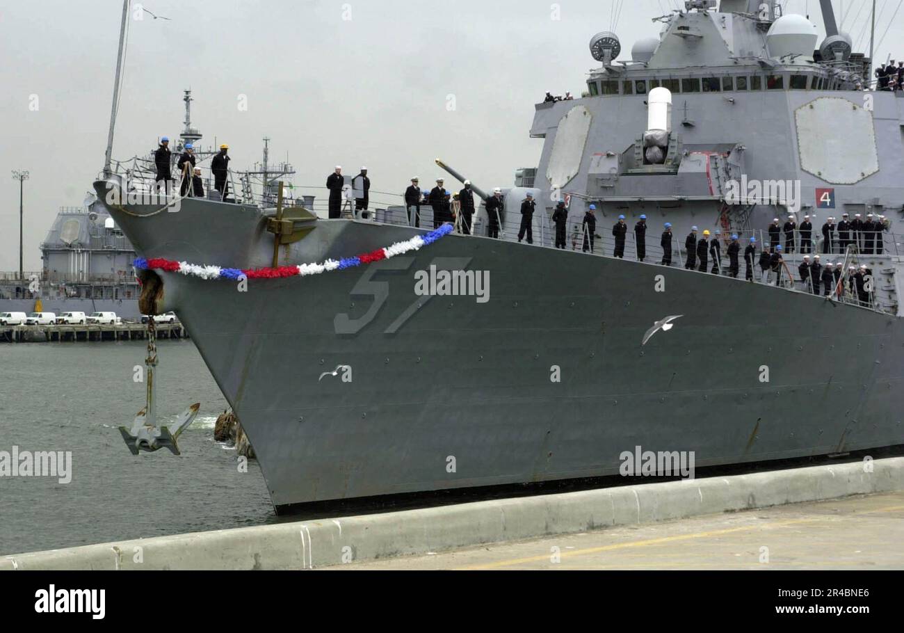 US Navy Sailors man-the rails aboard the guided missile destroyer USS ...
