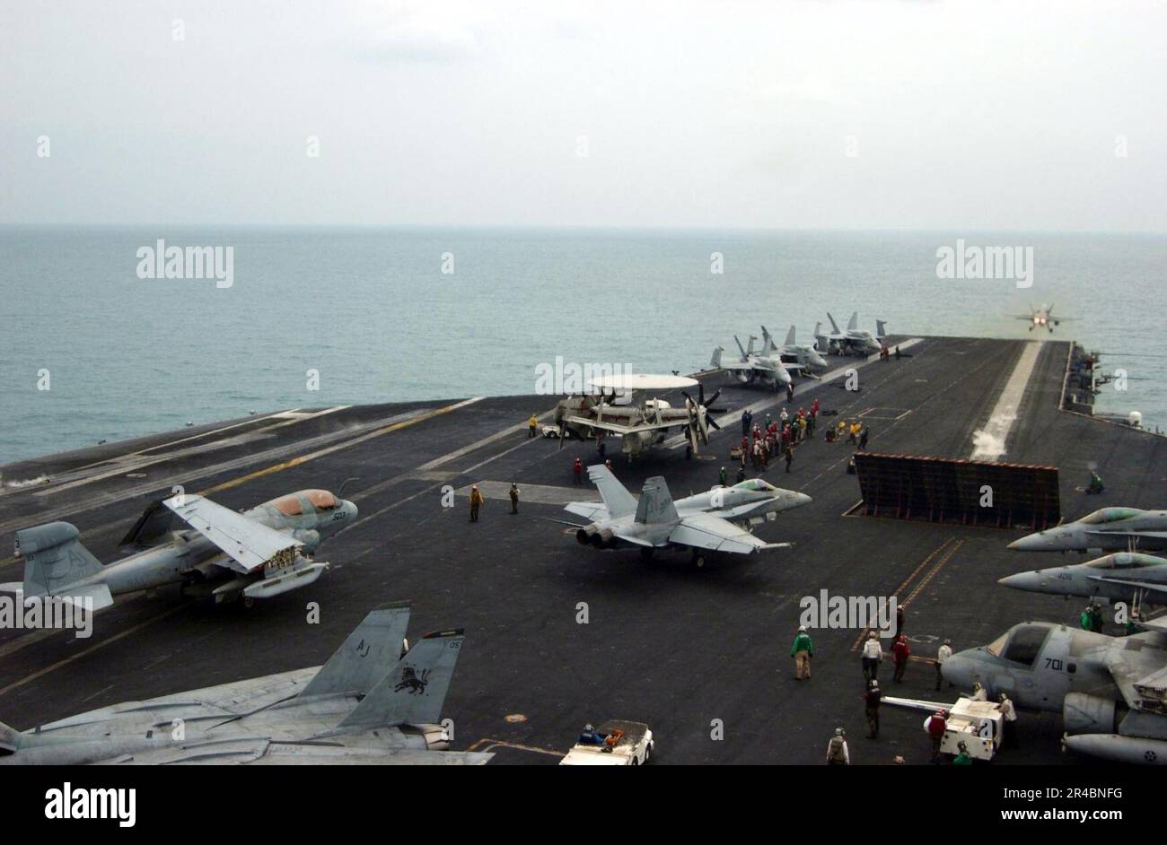 US Navy Aircraft line-up on the flight deck as they prepare for launch ...