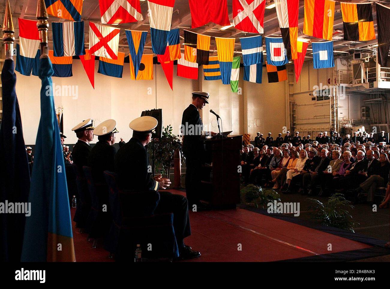 US Navy Capt. addresses the audience during a change of command ...