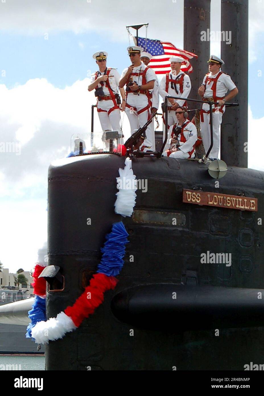 US Navy Crew members aboard the Los Angeles-class fast attack submarine ...