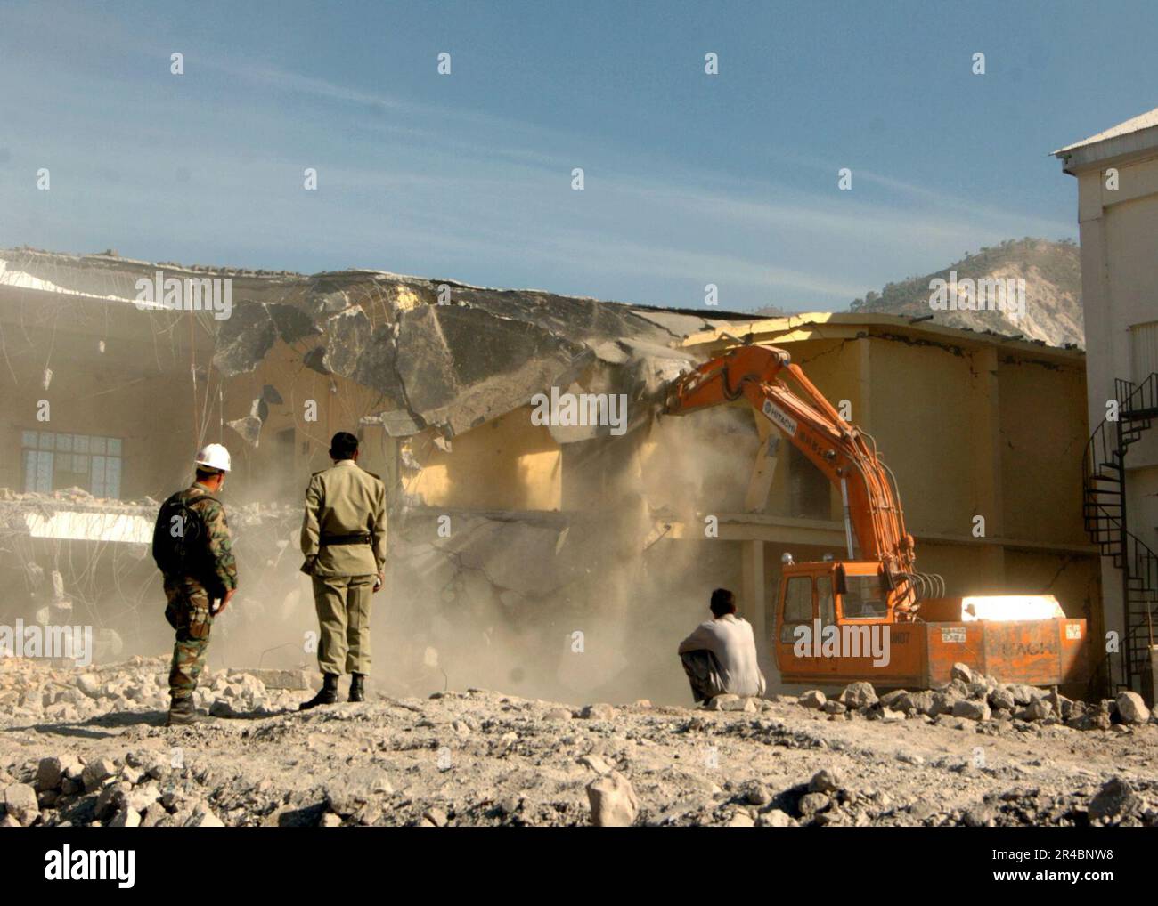 US Navy Pakistani engineers and a U.S. Navy Seabee assigned to Naval ...