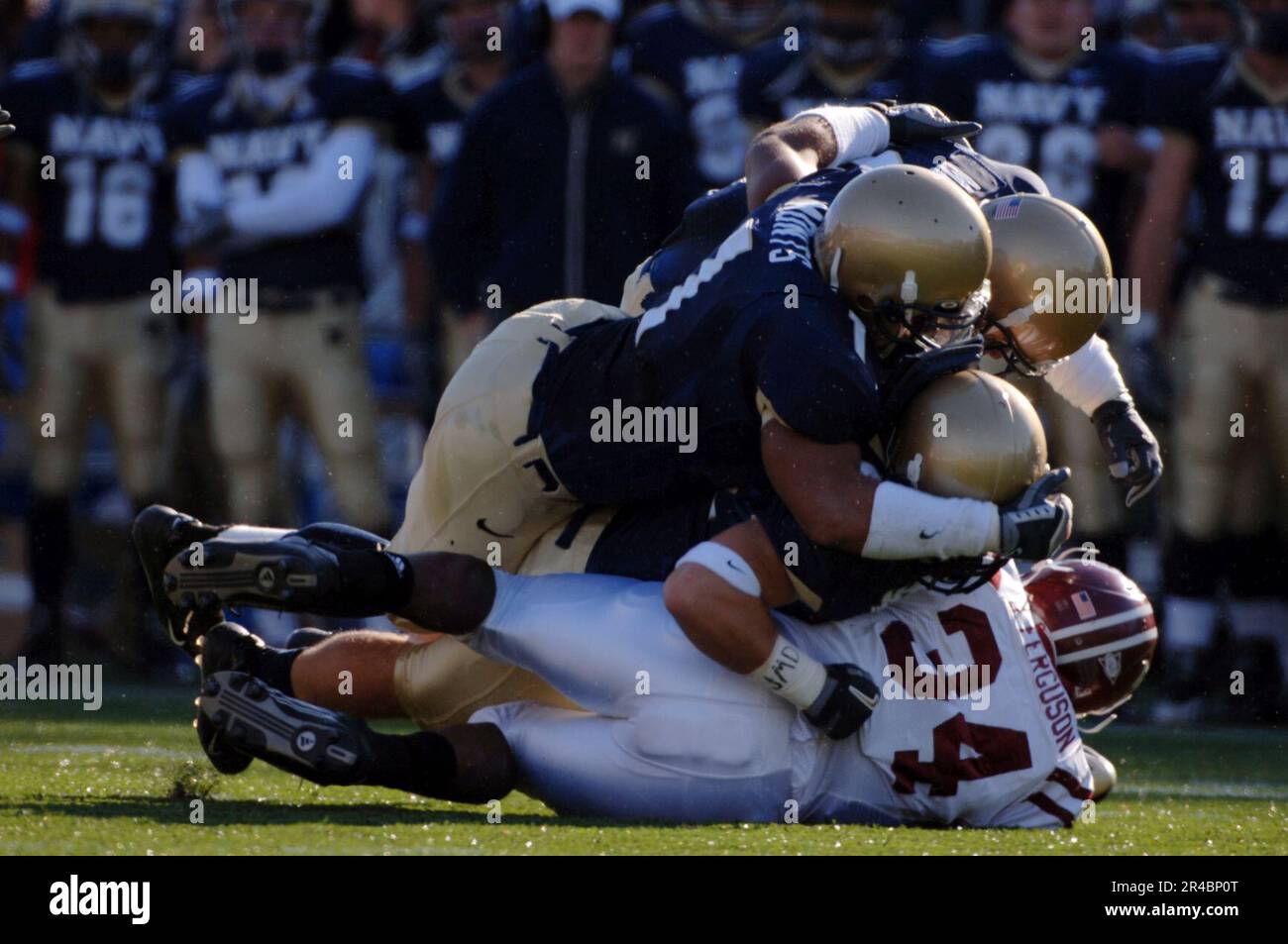 US Navy U.S. Naval Academy Midshipmen defenders pile onto Temple Owls ...