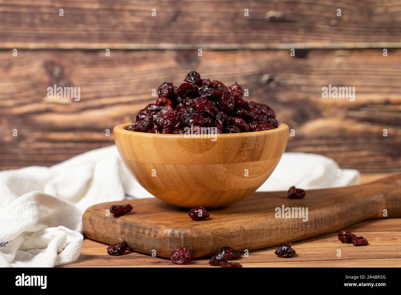 Dried Cranberry in bowl. Organic farm products. Sun-dried Cranberry on ...