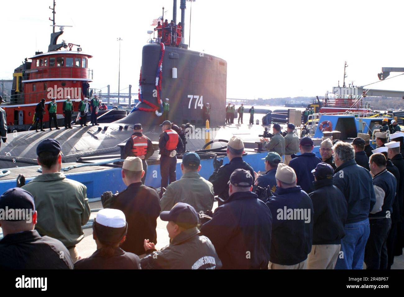 US Navy Friends and family members of Sailors assigned to the attack ...