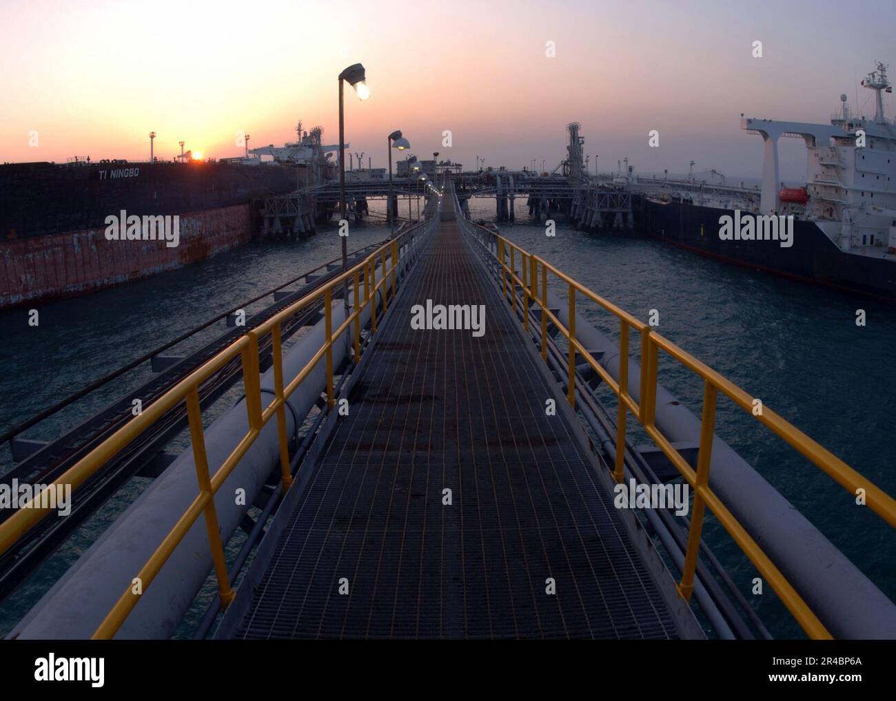 US Navy The sun rises over the Al Basra Oil Terminal (ABOT) in the ...
