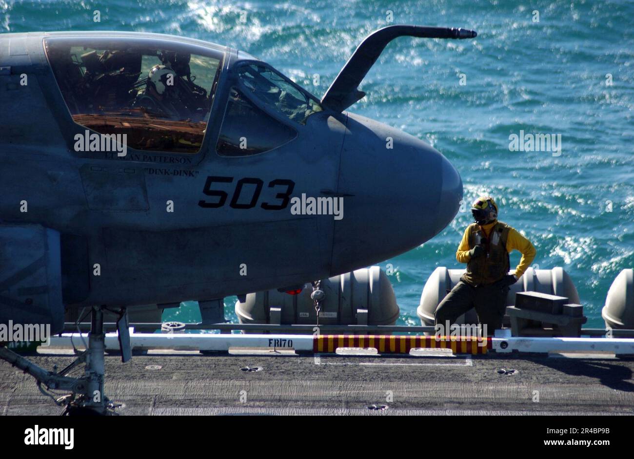 US Navy An Aviation Boatswain's Mate stands by as an EA-6B Prowler ...