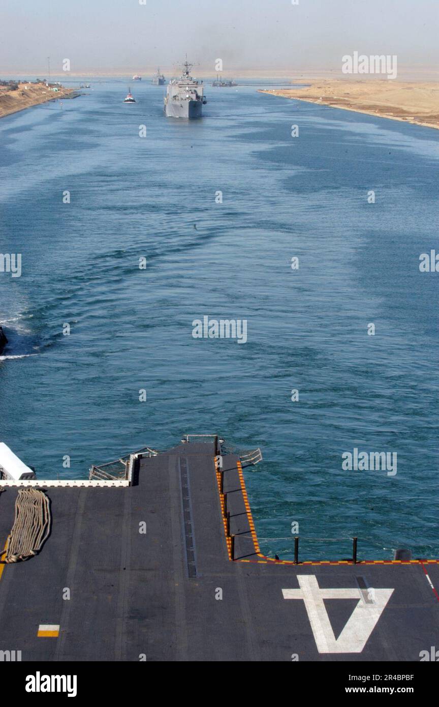 US Navy The dock landing ship USS Carter Hall (LSD 50) and the ...