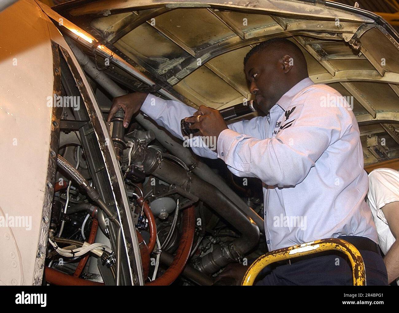 US Navy Aviation Machinist's Mate 1st Class assigned to the Mad Foxes ...
