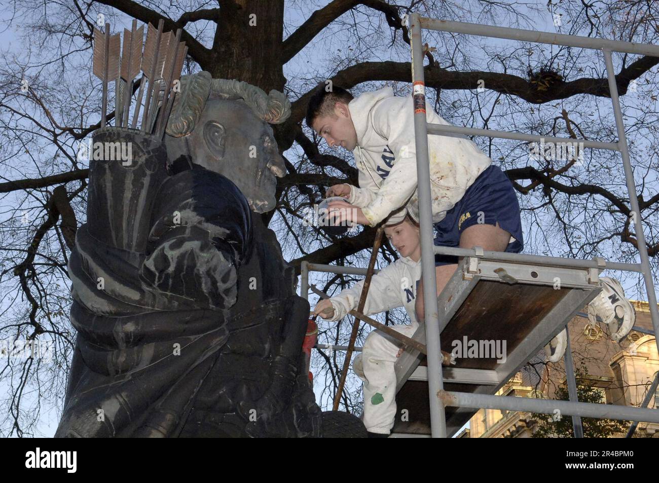 US Navy U.S. Naval Academy Midshipman paint the statue of Tecumseh ...