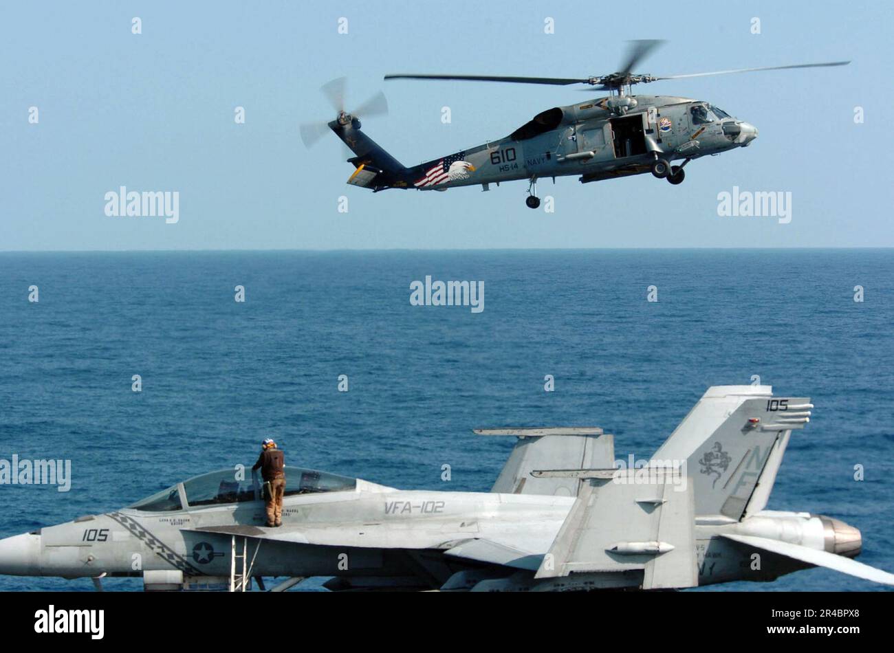 US Navy A plane captain assigned to the Diamondbacks of Strike Fighter ...