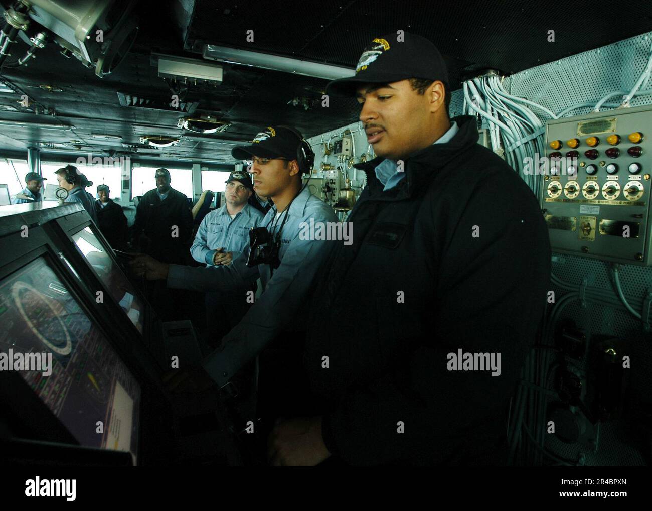 US Navy Personnel on the bridge aboard the Nimitz-class aircraft ...