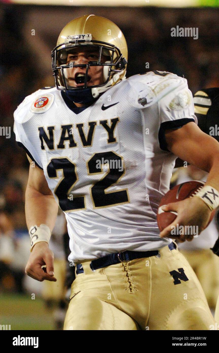 US Navy Navy fullback (22) crosses the goal line for one of his two ...