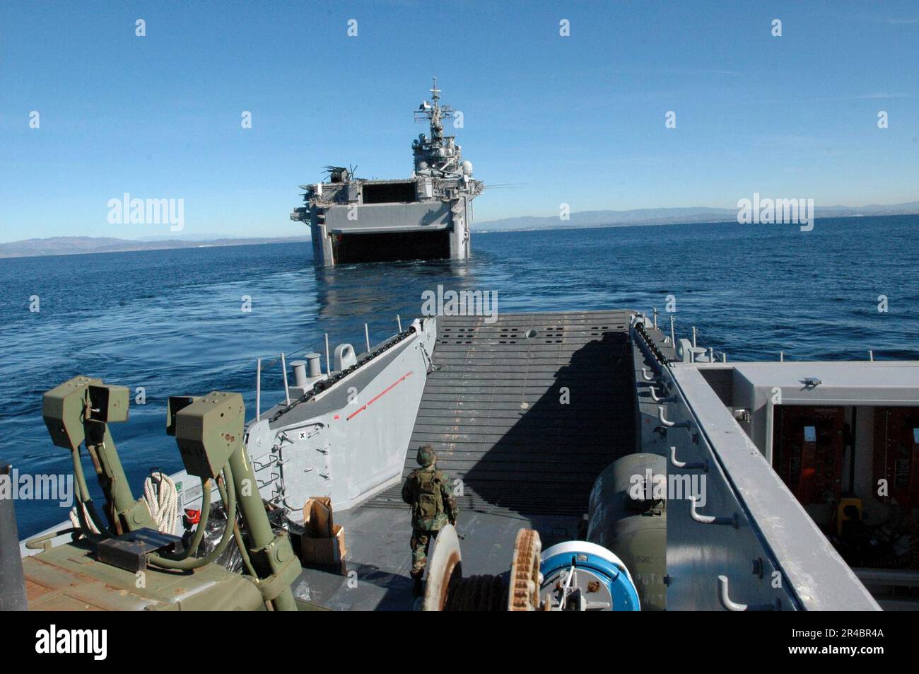 US Navy A Landing Craft, Utility (LCU) backs out of the well deck of ...