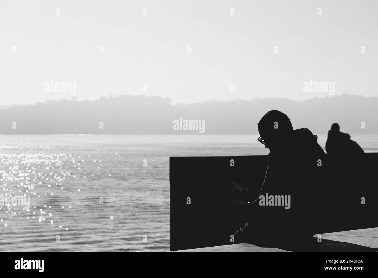 Man with grey hair seated Black and White Stock Photos & Images - Alamy