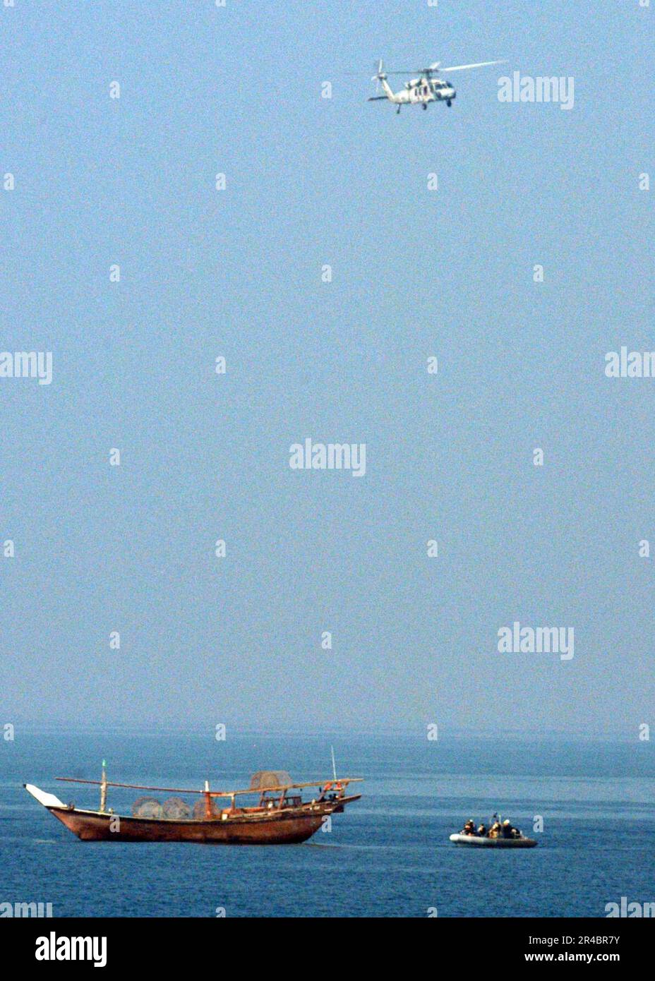 US Navy Sailors assigned to the amphibious transport dock USS Austin ...