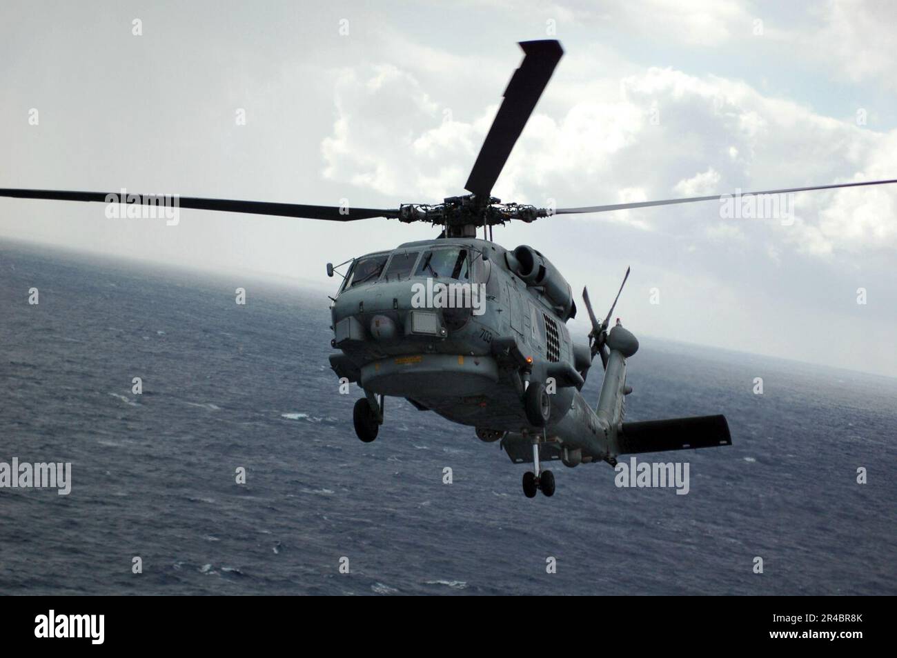 US Navy An SH-60B Seahawk helicopter stands by for search and rescue ...