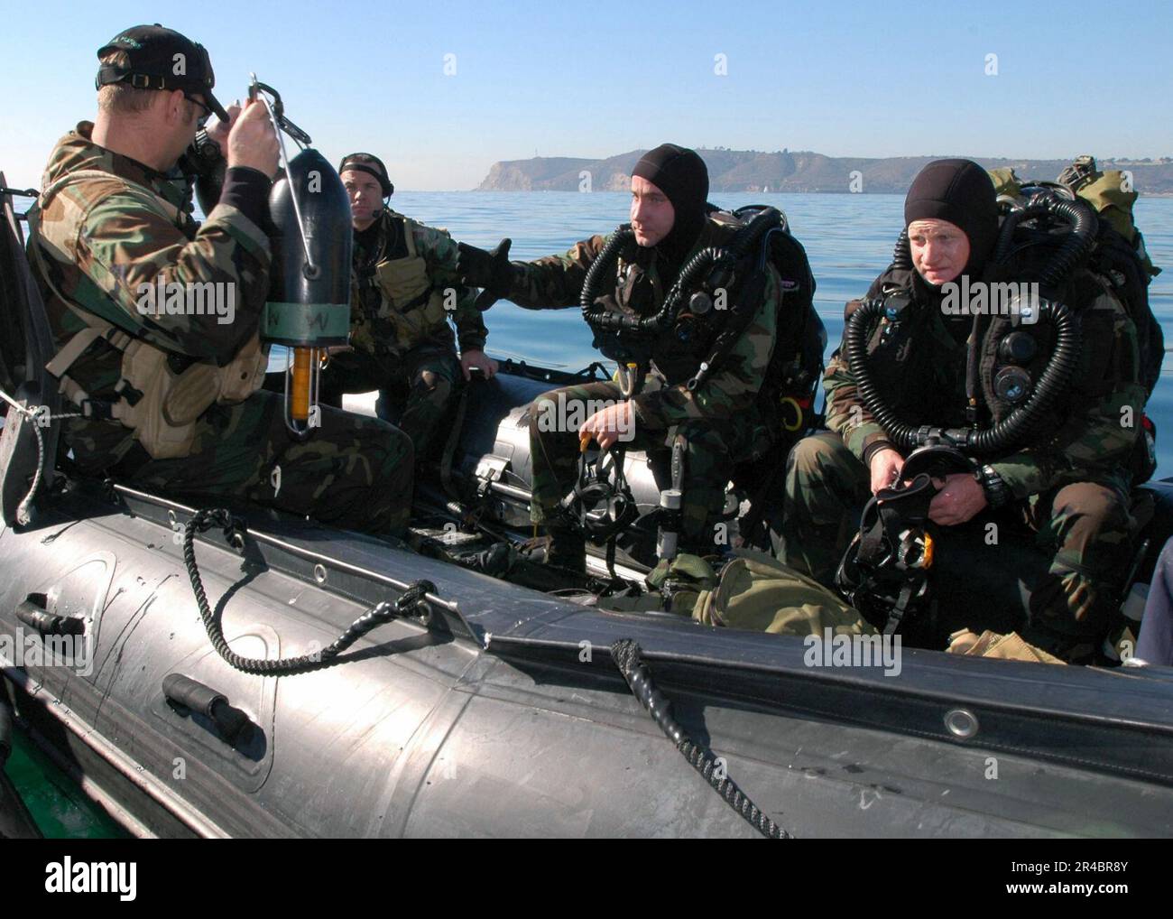 US Navy Divers assigned to the Navy's Special Clearance Team One (NSCT-1), prepare for a joint ...