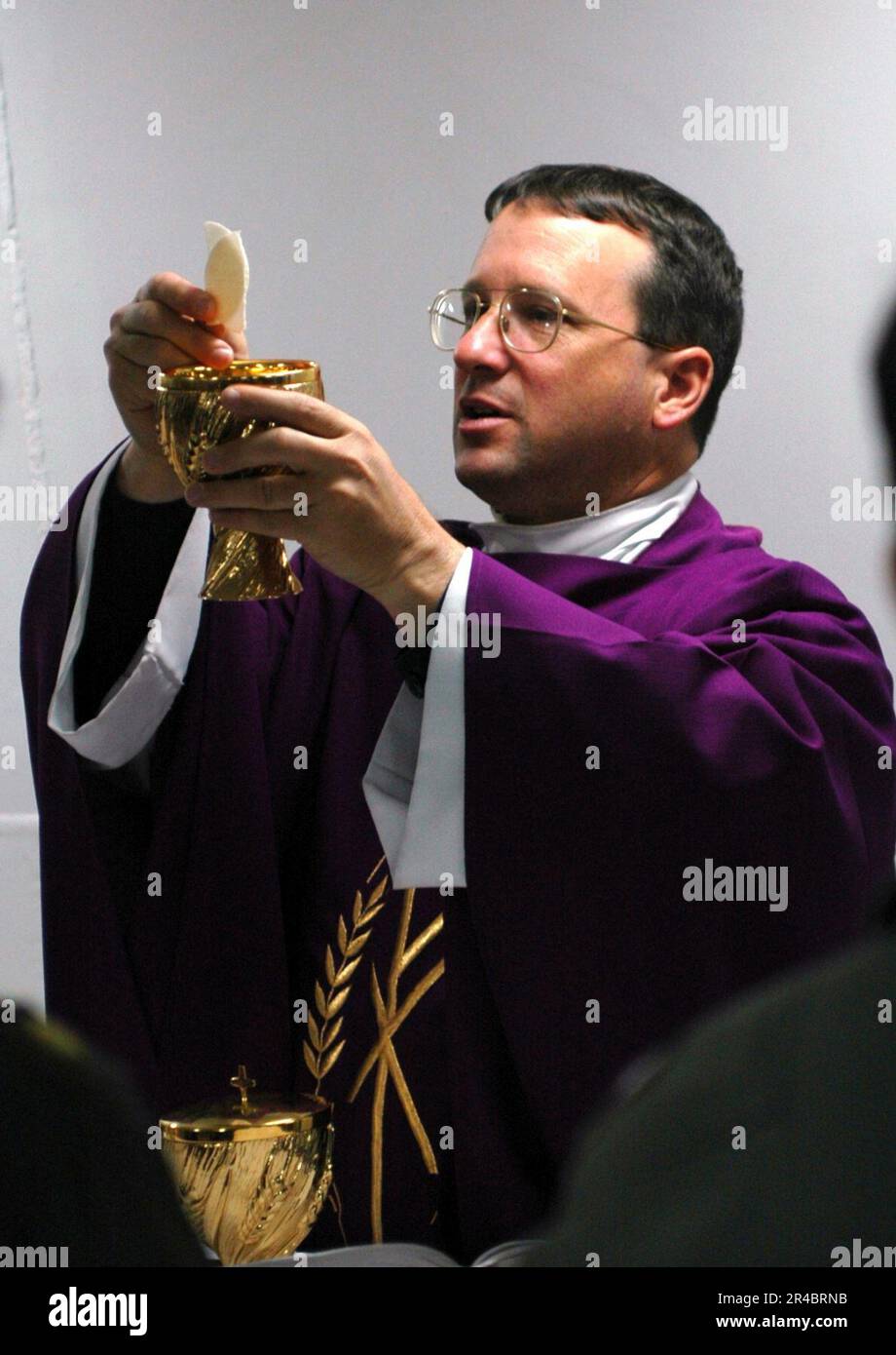 US Navy U.S. Navy Chaplain, Lt. performs Catholic services for the crew ...