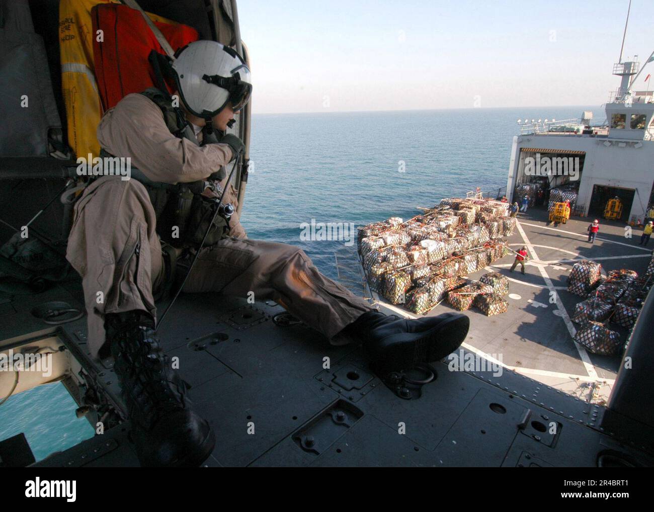 US Navy Aviation Electronics Technician 3rd Class tells the pilot where ...