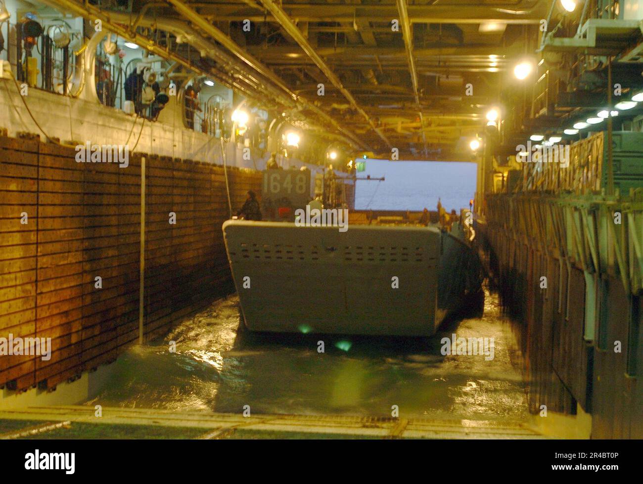 US Navy Landing Craft Unit One Six Four Eight (LCU-1648) floats back ...