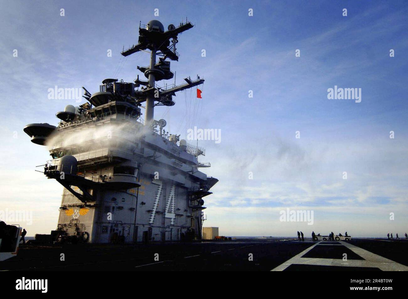 US Navy Aqueous Film Forming Foam (AFFF) sprays from the island ...
